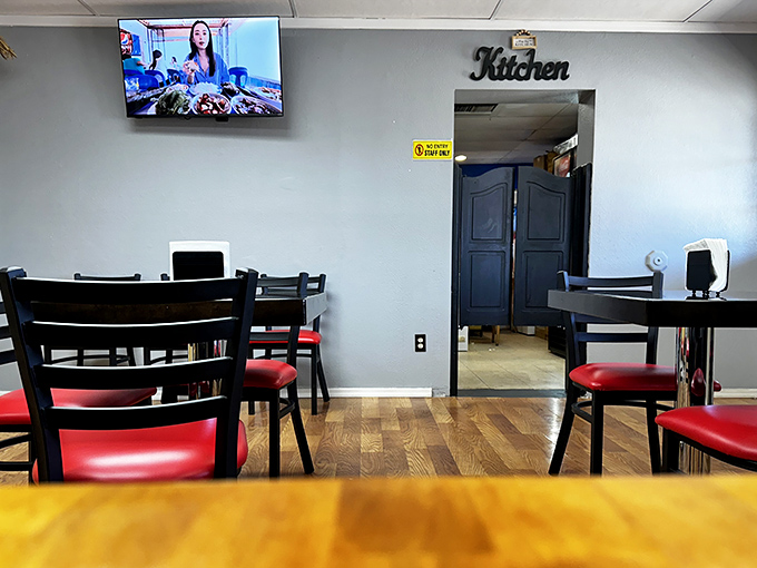 The dining area may be modest, but the flavors are anything but. Simple tables and chairs keep the focus where it belongs &ndash; on the food.