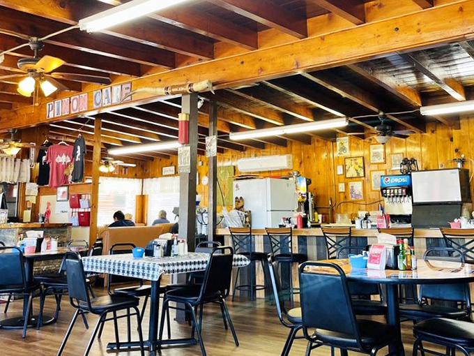 The warm, wood-filled interior feels like stepping into a friend's cabin for a home-cooked meal.