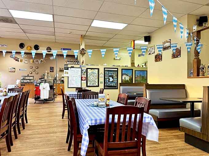 Blue-checkered tablecloths and Bavarian pennants create an atmosphere that's both festive and homey &ndash; no pretension, just good vibes.