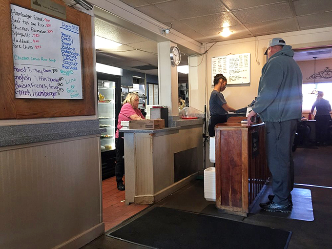 Where the magic happens! Peek behind the curtain and witness the bustling heart of Todd's, pumping out deliciousness with clockwork precision.