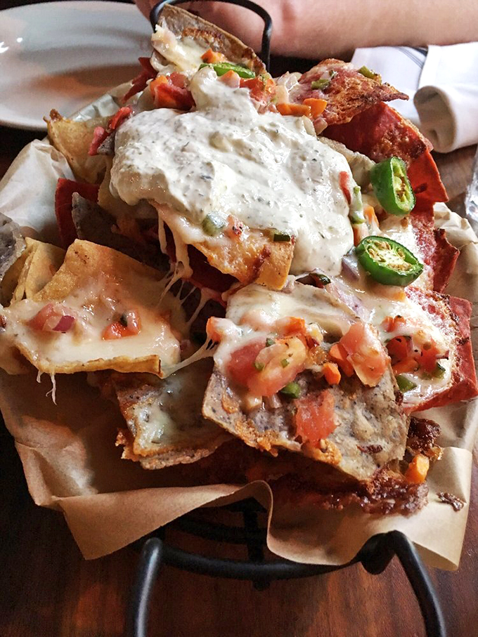 Nacho average appetizer! This mountain of cheesy goodness is like edible Jenga for grown-ups.