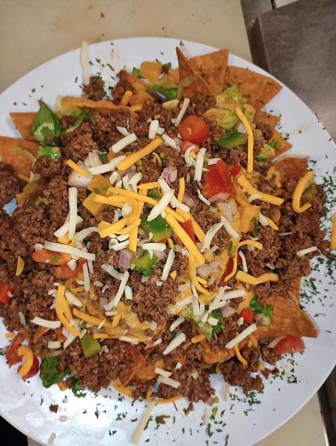 A mountain of nachos that requires a climbing strategy &ndash; each bite delivering the perfect balance of toppings.