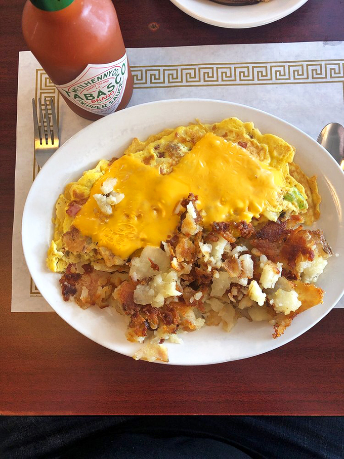 This omelet and hash brown combo is the breakfast equivalent of a standing ovation.Bravo, Todd's, bravo!