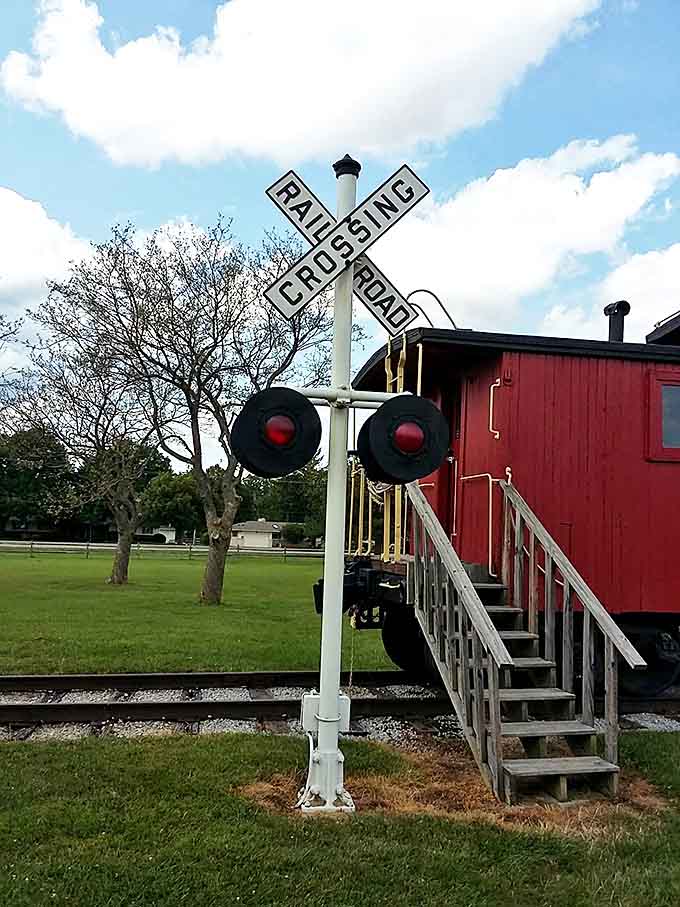 This railroad crossing sign stands sentinel, a reminder of when the train's arrival was the day's biggest event in small-town America.