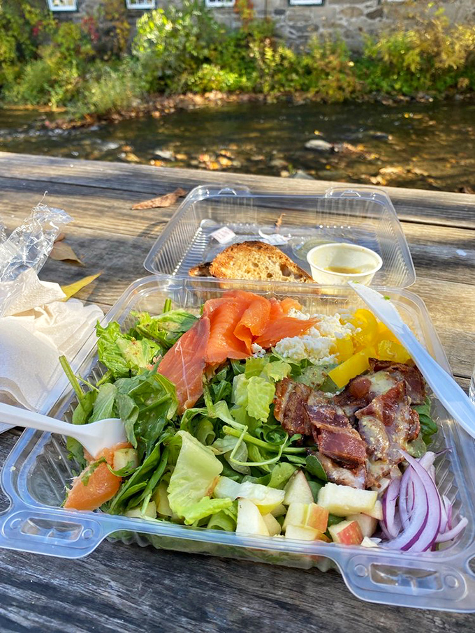 Riverside dining at its finest: This hearty salad with smoked salmon and all the fixings tastes even better with Vermont's natural beauty as backdrop.