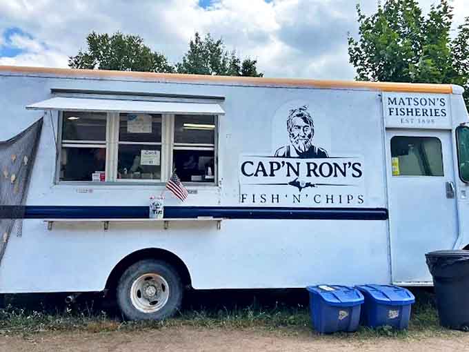 The side view reveals the truck's humble exterior &ndash; a reminder that culinary greatness often hides in the most unassuming packages.