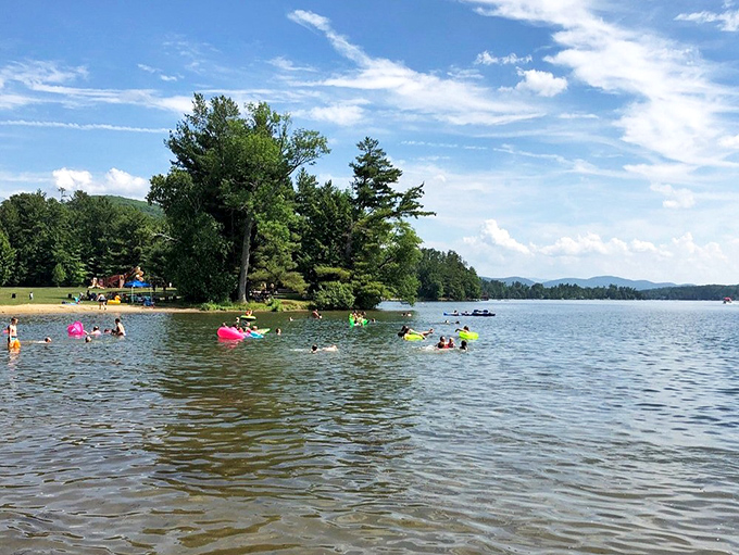 Summer swimmers dot the clear waters like human sprinkles on nature's sundae. The gradual slope makes this beach perfect for everyone from toddlers to triathletes-in-training.