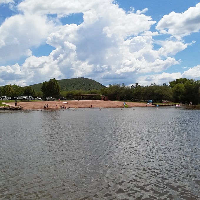 Families cool off at Patagonia Lake's swimming beach, a refreshing respite from the Arizona sun.