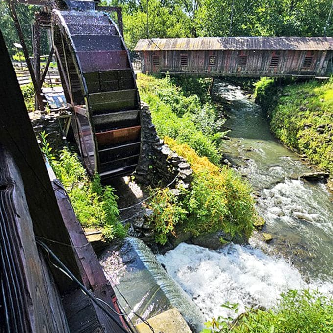 Where rushing water meets historic engineering, creating a scene so quintessentially American it should be on currency.