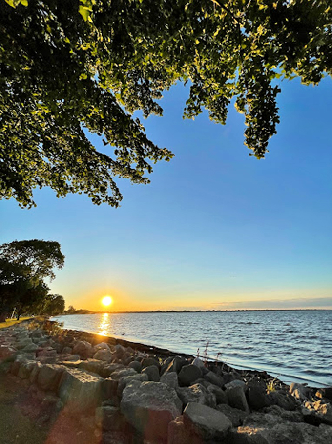 Calm waters and a sandy shore create the perfect backdrop for a day of family fun.