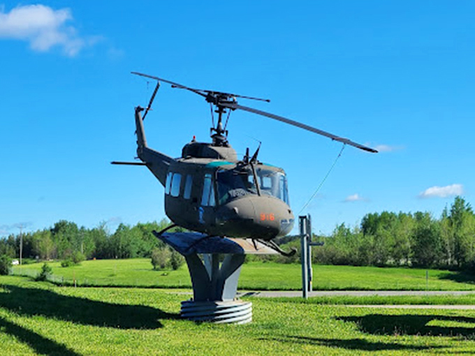 Ore-some spectacle! Chisholm's man of mettle stands tall, a testament to Minnesota's iron will.