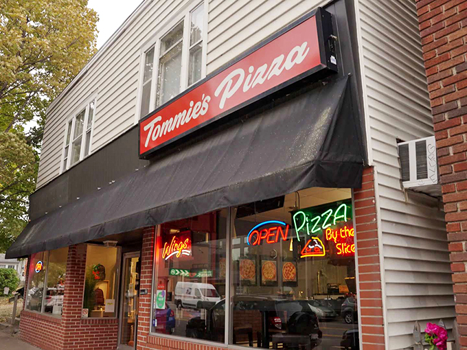 Where the crust is thin, the toppings are generous, and the cheese... oh, the cheese! It's enough to make a dairy farmer blush.