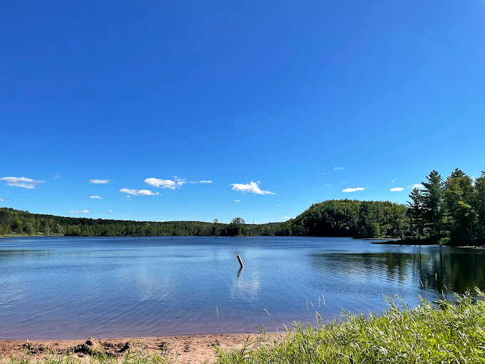 Red-tinged rocks and plunging falls create a Martian landscape. No need for a SpaceX ticket to feel like you're on another planet!