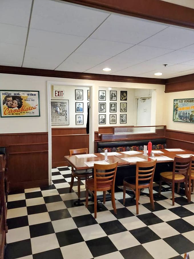 Classic movie posters and vintage decor create an atmosphere that's authentic without feeling like a theme park.