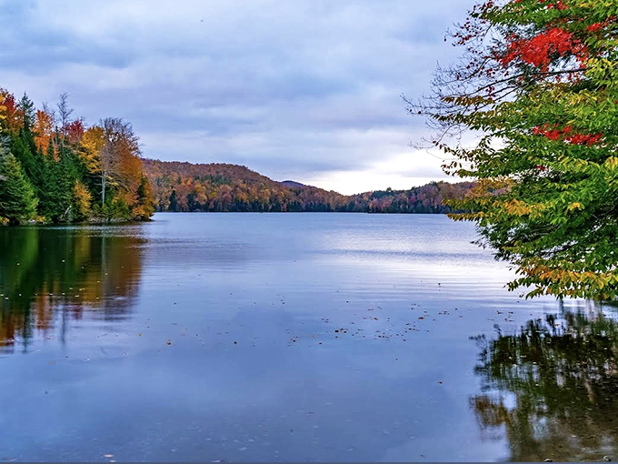 Autumn's reflection doubles the visual feast as still waters capture every nuance of Vermont's legendary fall color display.