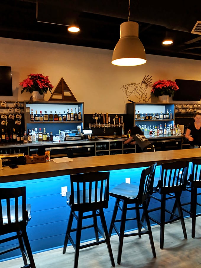 The bar glows blue like Caribbean waters, promising tropical libations that'll have you forgetting you're in Maine.