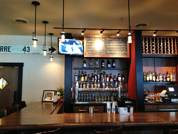 The bar showcases craft brews and spirits, ready for mixing into your next favorite Cornerstone cocktail.