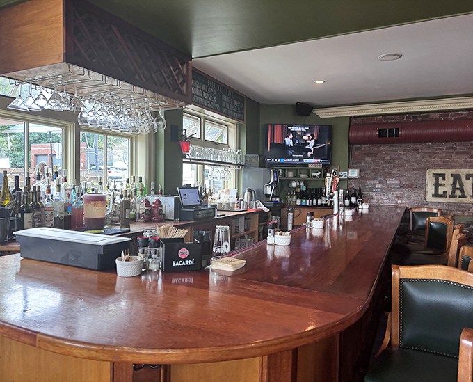 The bar area invites solo diners and couples alike, offering front-row seats to the cocktail-crafting action and easy conversation.