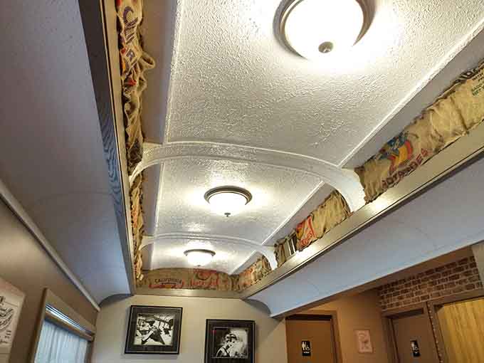 Even the ceiling gets decorative treatment here, proving attention to detail extends to every corner of this place.