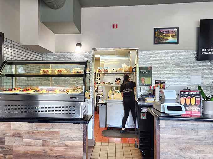 A glimpse behind the scenes reveals a clean, organized operation where your breakfast dreams become delicious reality through actual culinary skill.