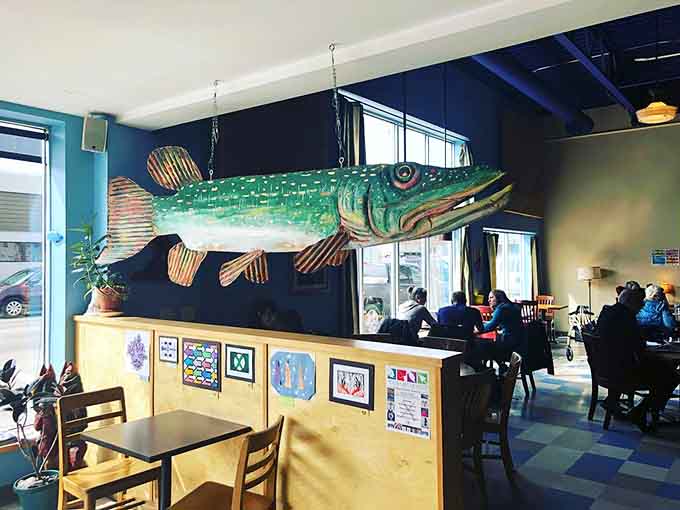 That oversized fish sculpture adds personality without trying too hard, much like the coffeehouse itself in this charming Mississippi River town.
