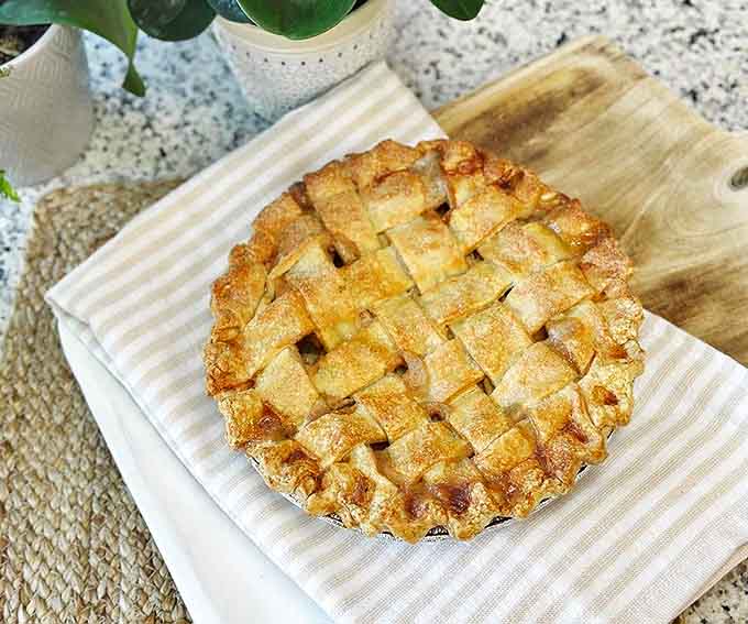 This lattice-topped apple pie isn't just dessert &ndash; it's edible art that would make your grandmother simultaneously proud and jealous.