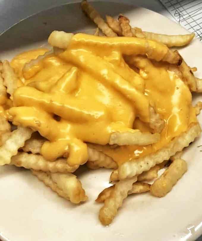 Golden, crispy fries with melted cheese&mdash;because sometimes lunch needs to be as comforting as breakfast.