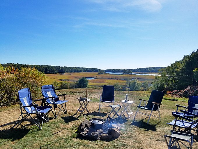 Chewonki Campground's peaceful waterfront setting invites visitors to pause and breathe &ndash; where camping chairs and sunset views create perfect end-of-day memories.