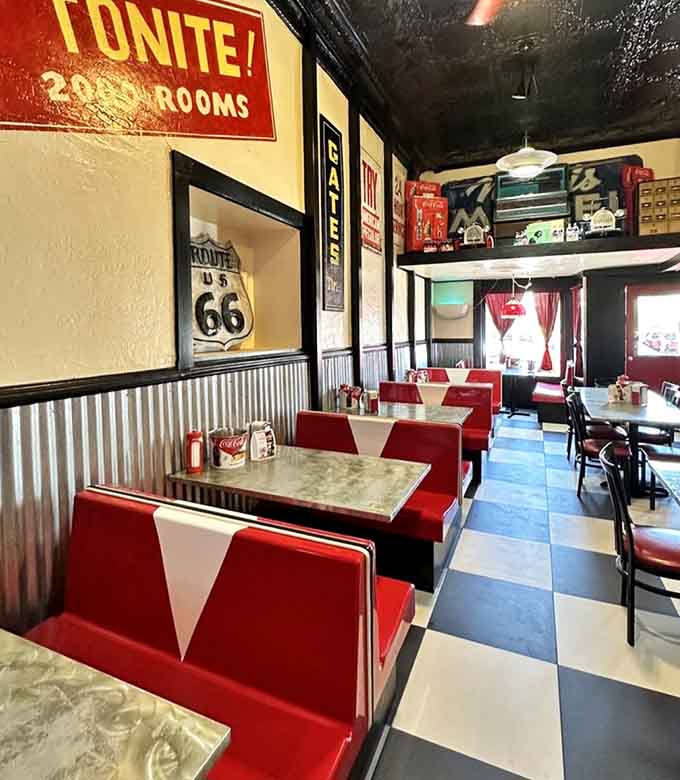 Red vinyl booths and vintage memorabilia create the perfect backdrop for enjoying comfort food that tastes like pure Americana happiness.