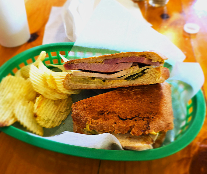 The Cuban sandwich gets pressed to melty perfection, creating that ideal combination of crispy bread and gooey cheese that makes lunch exciting.