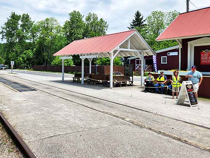 The red Peninsula depot stands as a welcoming gateway to rail adventures, its historic architecture transporting visitors to simpler times.
