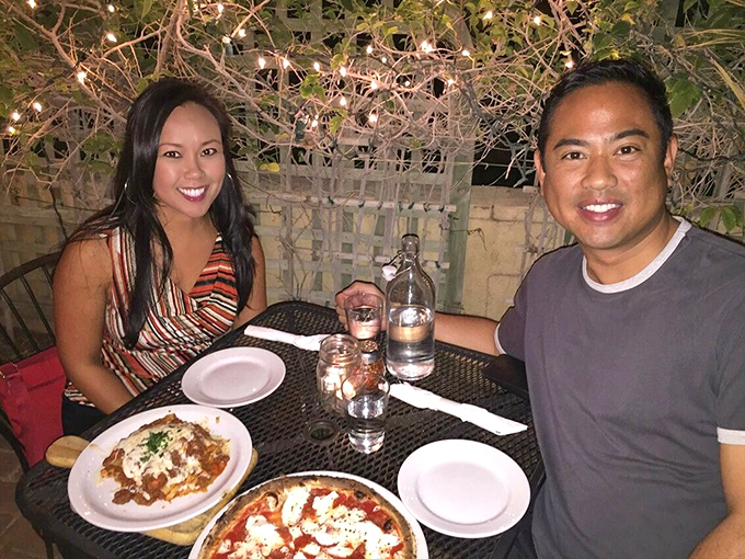Diners: Happy patrons enjoying the fruits of Cibo's wood-fired oven on the twinkling patio &ndash; the universal expression of "we ordered exactly right" on display.
