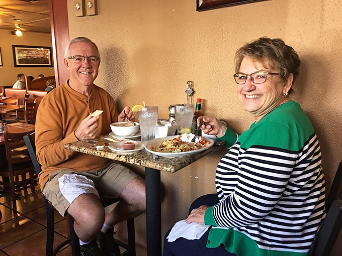 Diners: Happy patrons enjoying the universal language of good food, proving breakfast is better when shared with someone special.