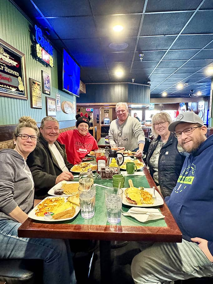 These happy diners know something you should—that Jimmy's Pour House delivers the kind of meal that makes you want to high-five strangers.