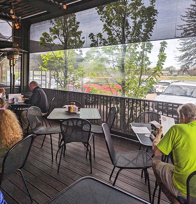 The screened porch lets you enjoy Michigan's fresh air while demolishing your meal, best of both worlds right there.