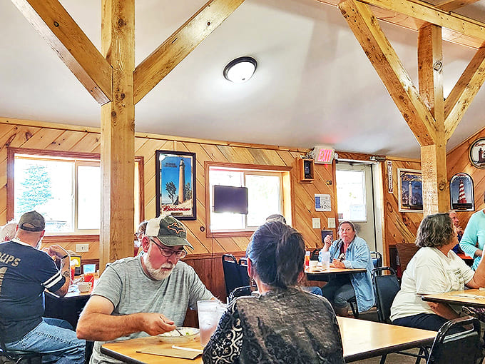 The dining room buzzes with conversation as locals and travelers alike share the universal language of "mmm" and "pass the ketchup, please."