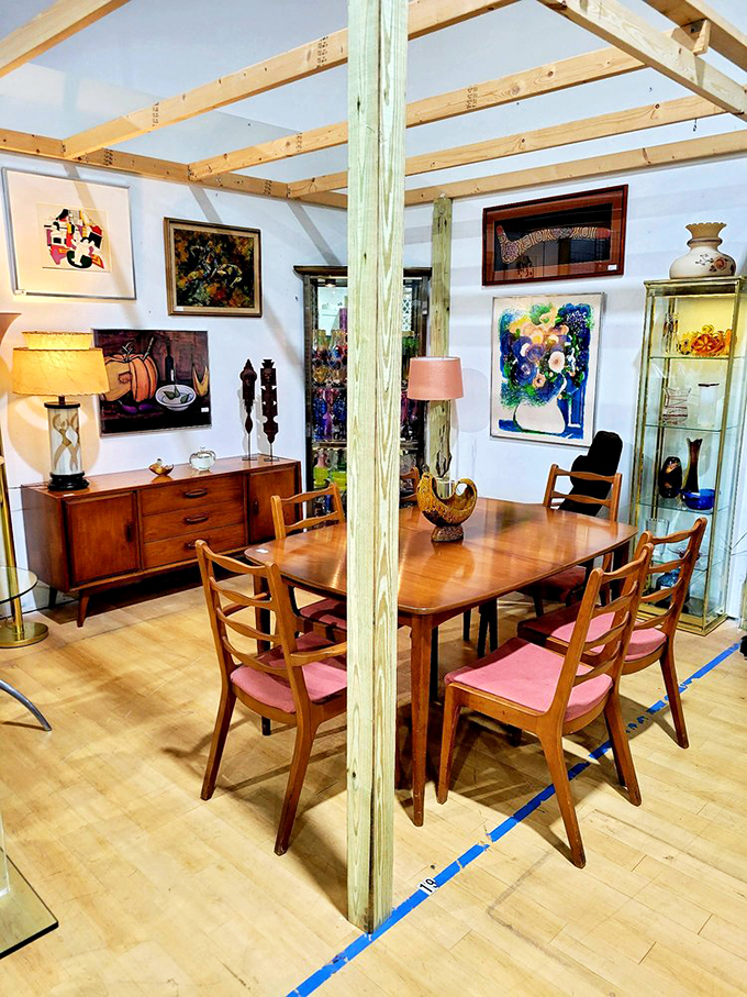 Mid-century modern meets artistic flair in this perfectly staged dining area that Don Draper would approve of.
