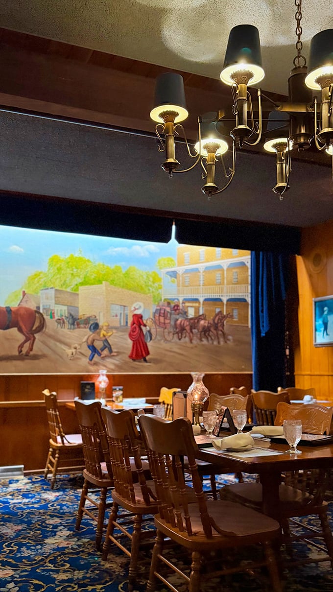The historic dining area features cozy corners where families have gathered for generations against a backdrop of Minnesota limestone.