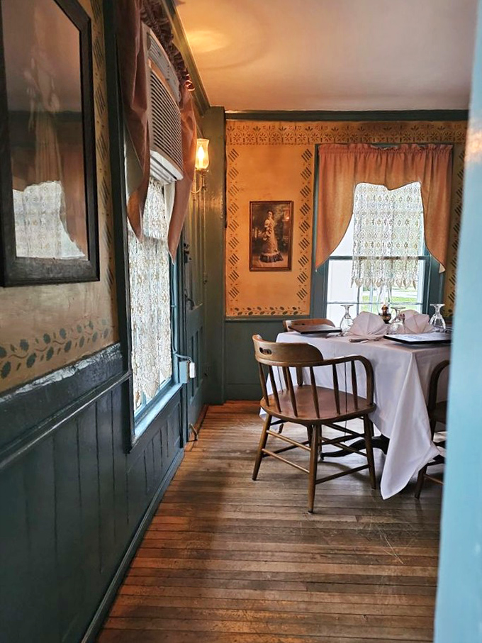 Warm wood tones, period-appropriate d&eacute;cor, and soft lighting create dining spaces that feel both intimate and connected to Vermont's rich past.