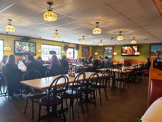 A full dining room during lunch service tells you everything you need to know about El Potro's reputation among locals.