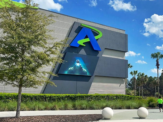 Behold, the mothership of motorsports! This gleaming temple of speed beckons thrill-seekers like a siren song, minus the whole crashing-into-rocks part.