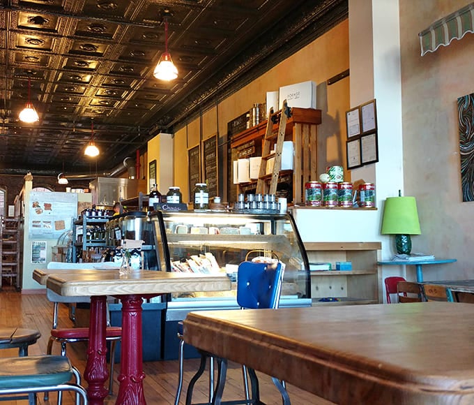 The service counter is where the magic happens, with fresh bagels and pastries displayed like the treasures they are.
