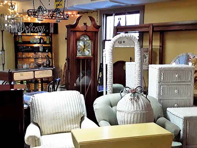 This charming vignette of wicker furniture and vintage timepieces creates a peaceful corner that feels like stepping into grandmother's sitting room.