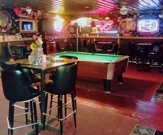 The pool table stands ready for post-dinner competition, because nothing settles a meal like friendly rivalry.