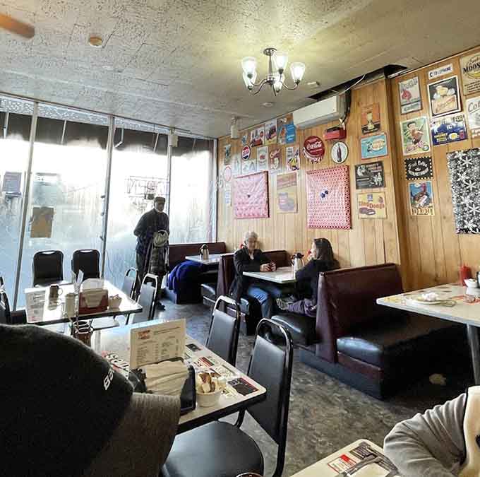 Booths and tables arranged for maximum comfort and people-watching, where regulars and newcomers alike find their perfect spot to settle in.