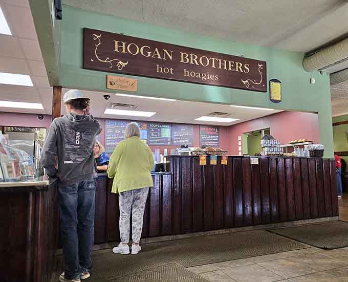 The ordering counter where sandwich dreams begin, staffed by folks who genuinely care about getting your hoagie exactly right every single time.