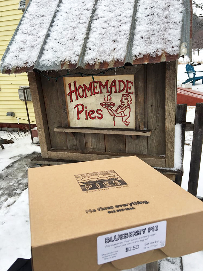 Even in winter, this snow-capped pie shack promises warmth in pastry form, a beacon of buttery hope in Vermont's chilly landscape.