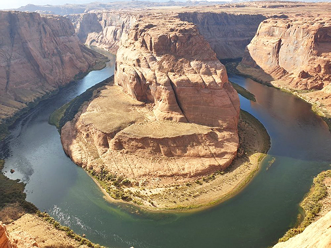 The Colorado River's most famous curve: where thousands come to capture nature's perfect bend.