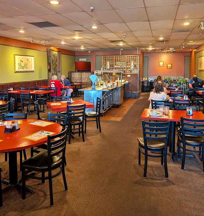 Another angle of the welcoming dining room where families, friends, and solo diners all find their happy place over shared plates.
