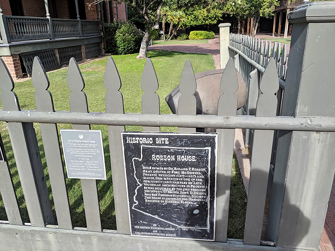 History 101: Dr. Rosson's legacy lives on! This plaque tells the tale of a house that's seen more drama than a soap opera.